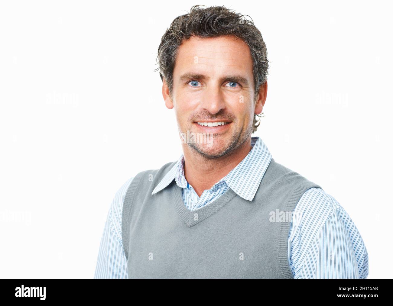 Business man smiling. Closeup of handsome business man smiling against ...