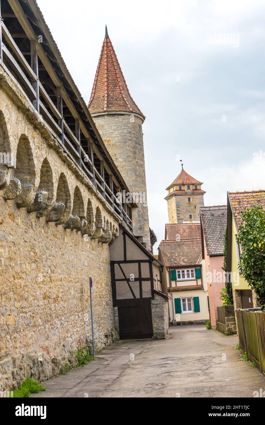 Vertical shot of a historic stone building in Rothenburg ob der Tauber ...