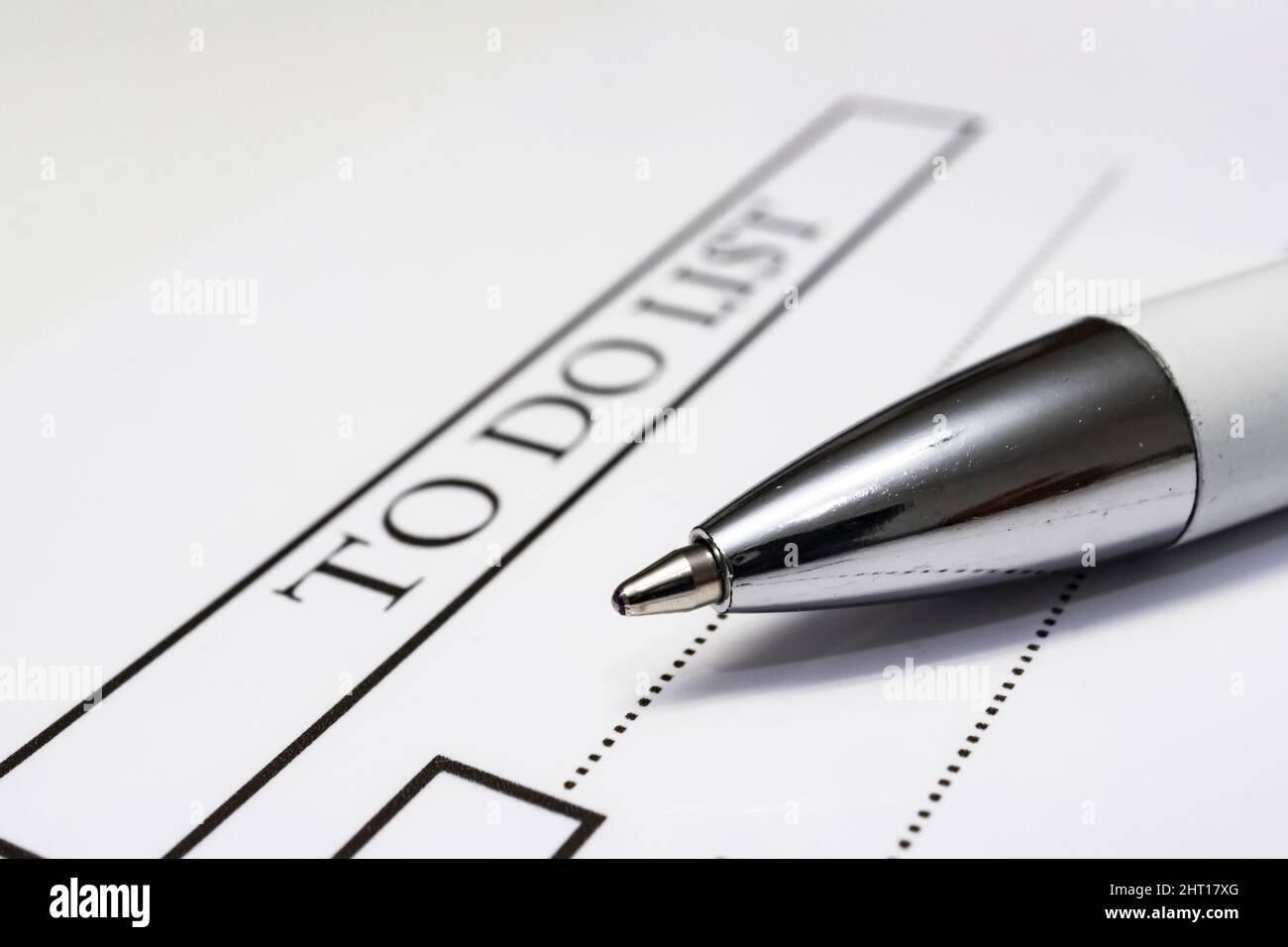 To do list form and pen Stock Photo - Alamy