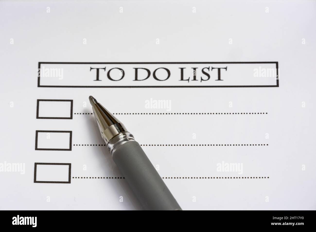 To do list form and pen Stock Photo - Alamy