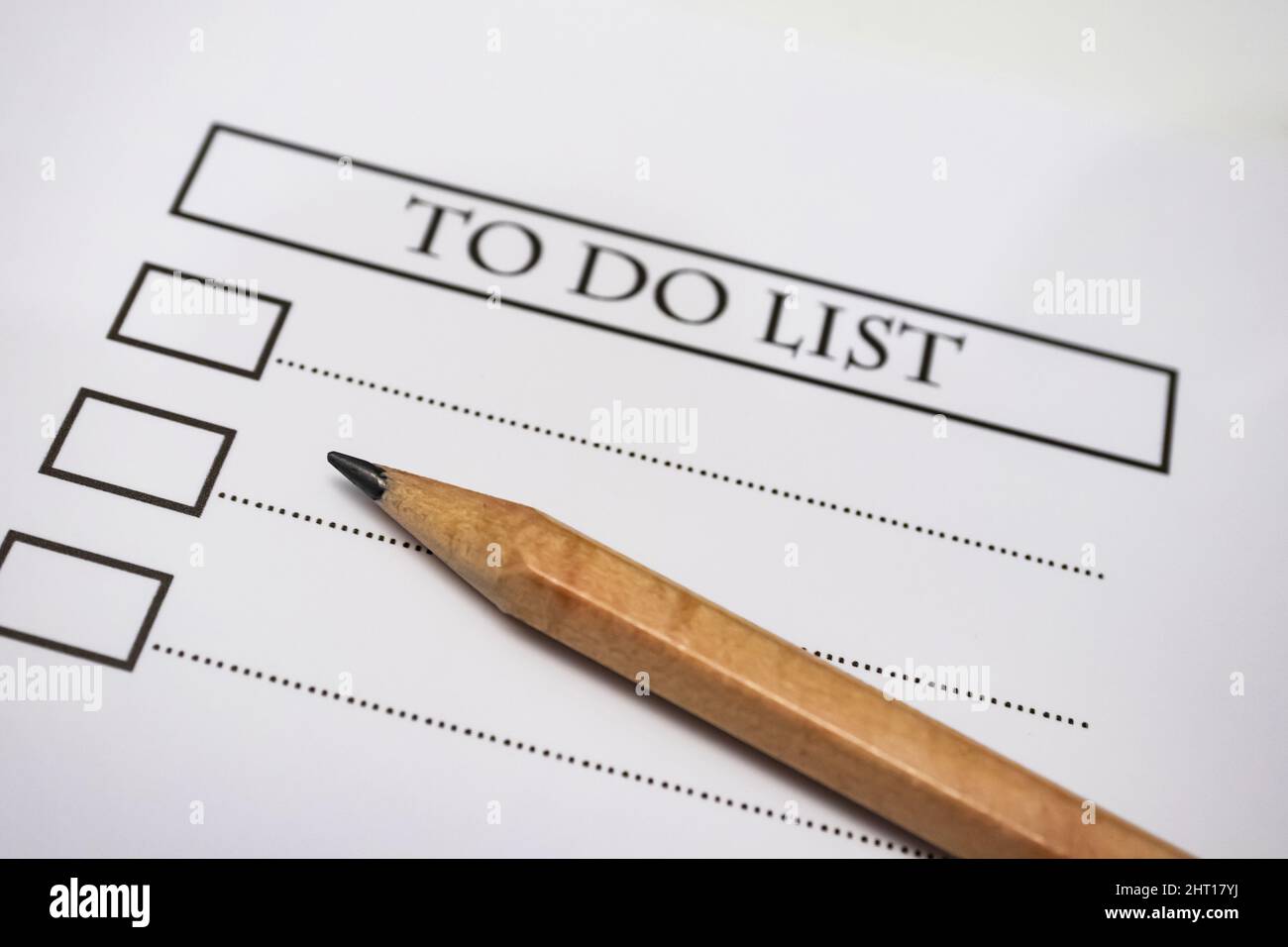 To do list form and pen Stock Photo - Alamy