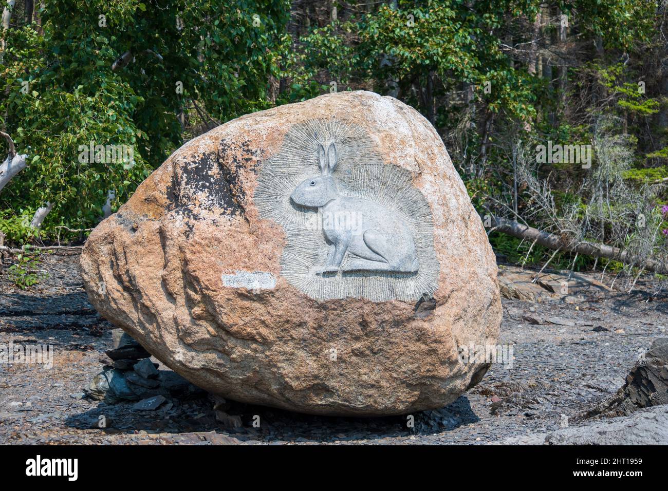View of a rabbit carving on a large stone Stock Photo - Alamy