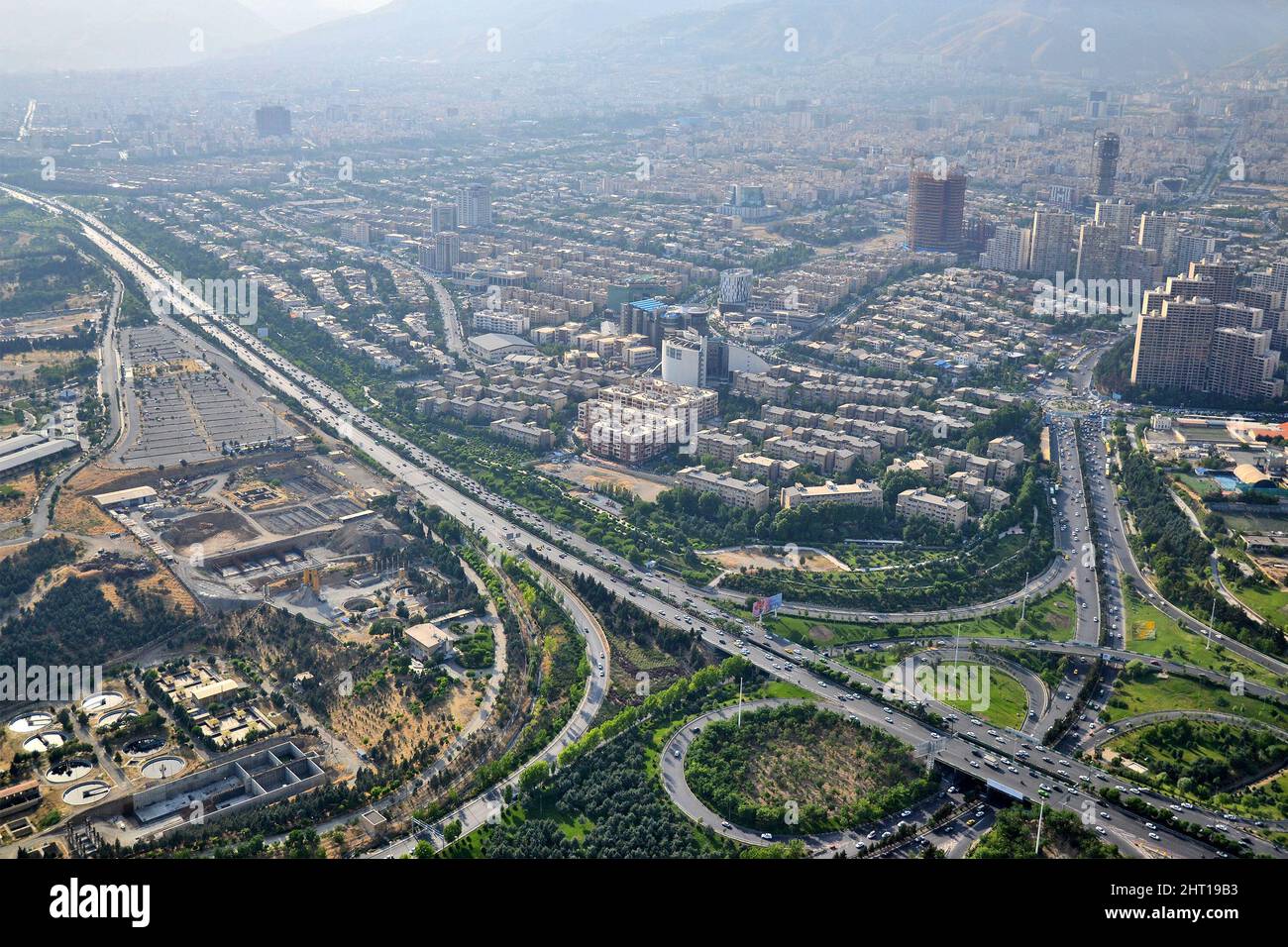 View of the city, highway and surrounding houses from the Milad Tower ...