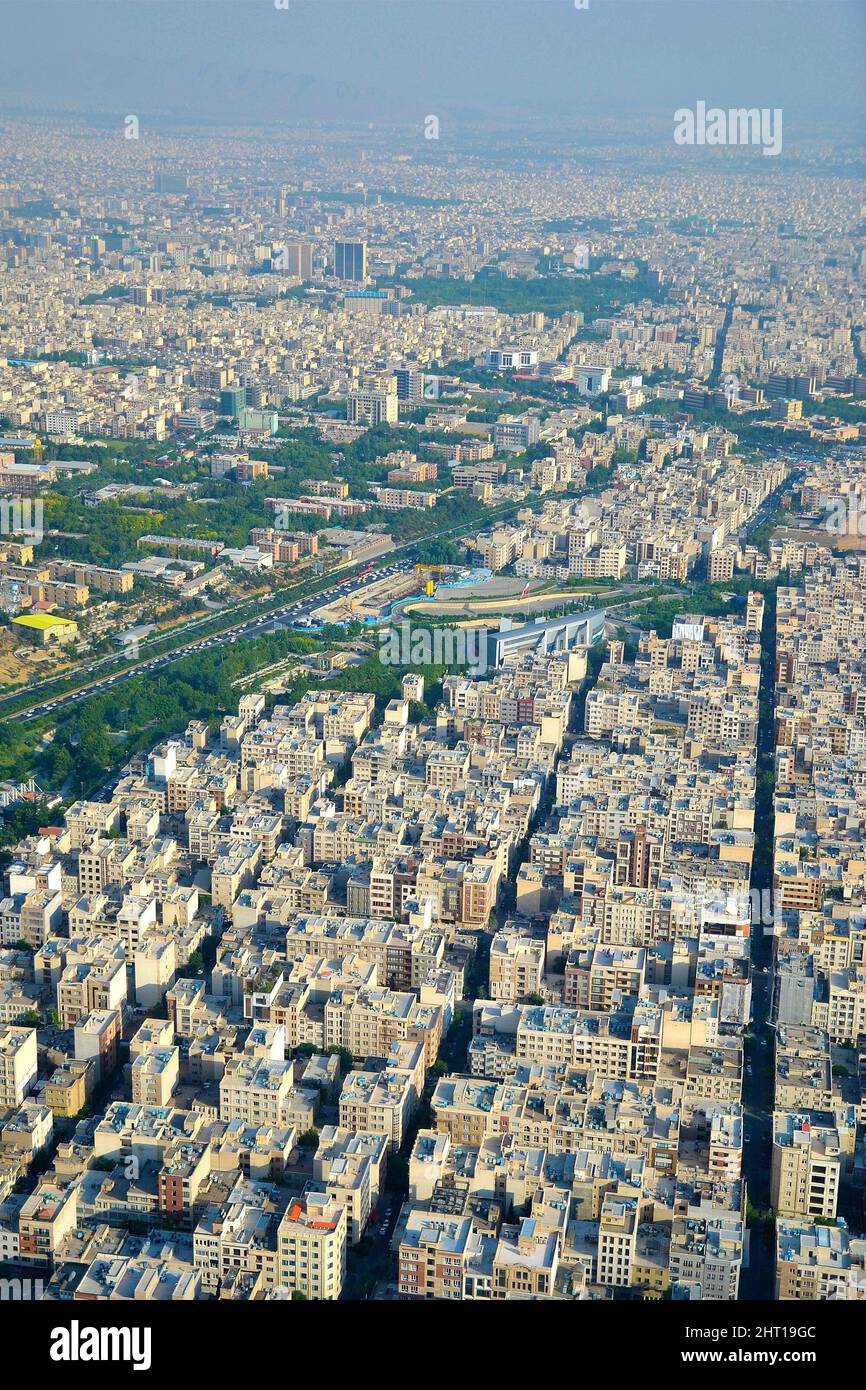View of the city, highway and surrounding houses from the Milad Tower ...