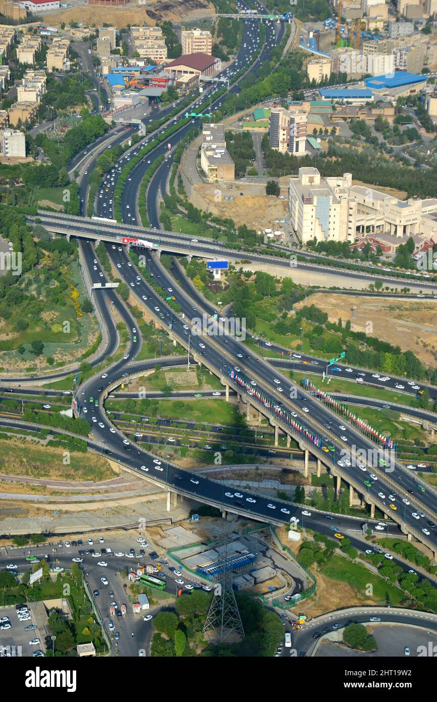View of the city, highway and surrounding houses from the Milad Tower ...