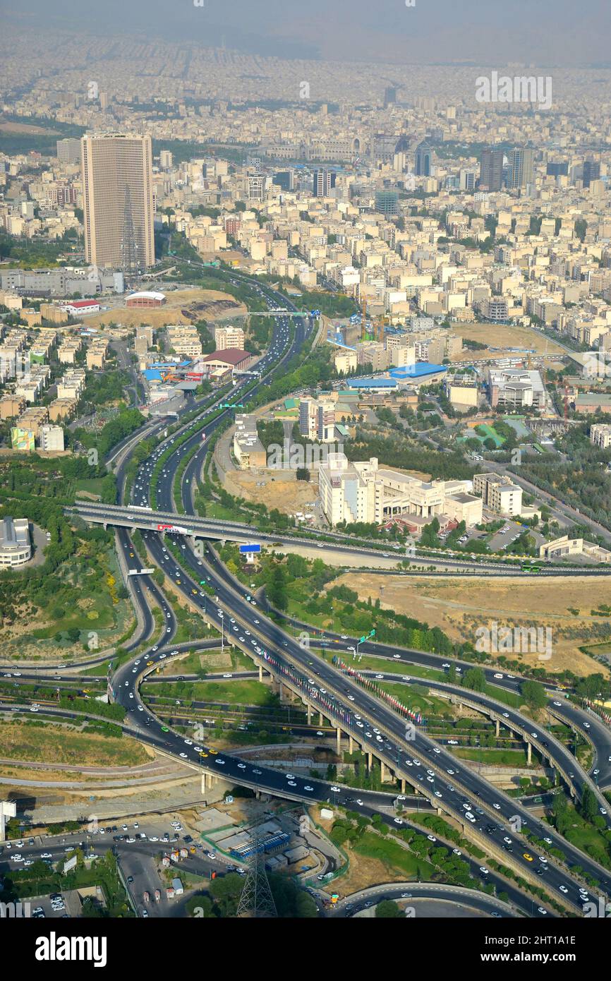 View of the city, highway and surrounding houses from the Milad Tower ...
