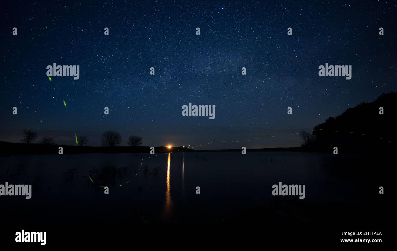 Light reflection on lake at night Stock Photo - Alamy