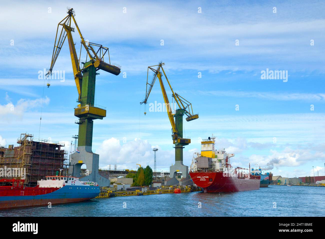 Gdansk, Poland - September 28, 2018: Shipyards and docks with cranes ...