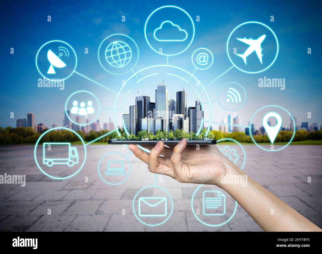 Hand holding mobile smart phone with modern buildings. Smart city, 5g ...