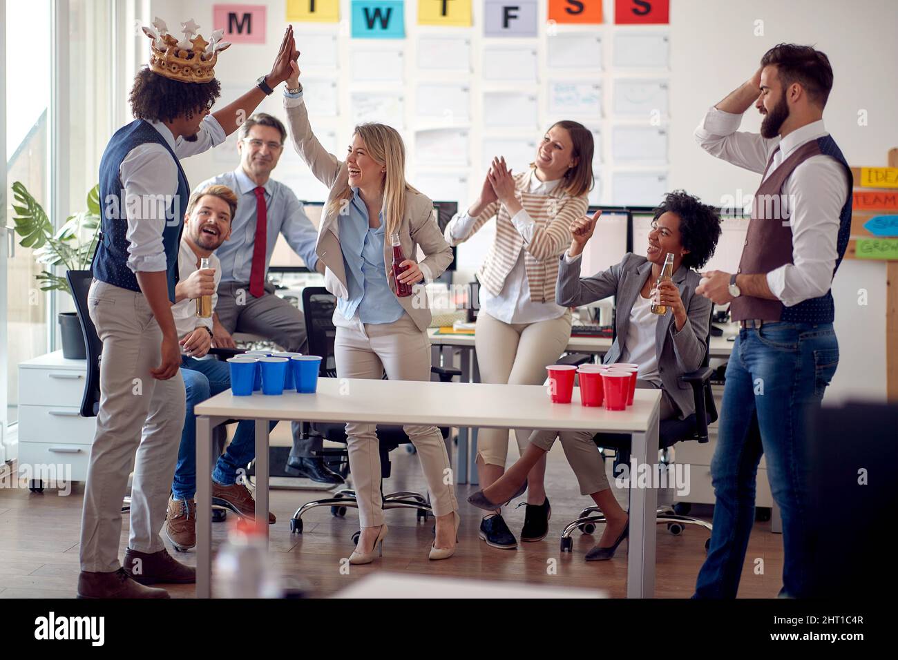 Employees are enjoying a break in a cheerful atmospherein the office ...