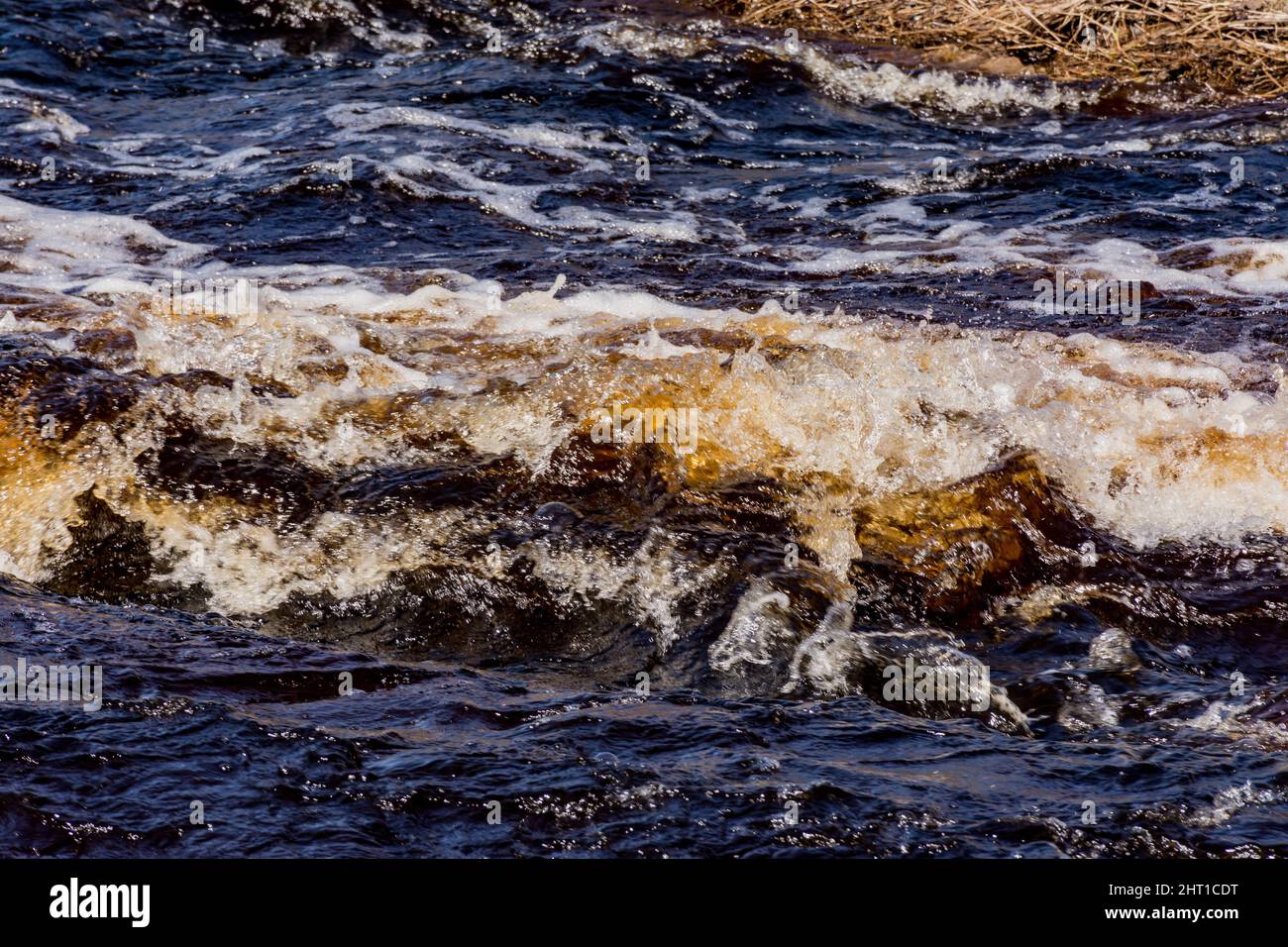 The texture of the rapid flow of water in the Lava River Stock Photo ...