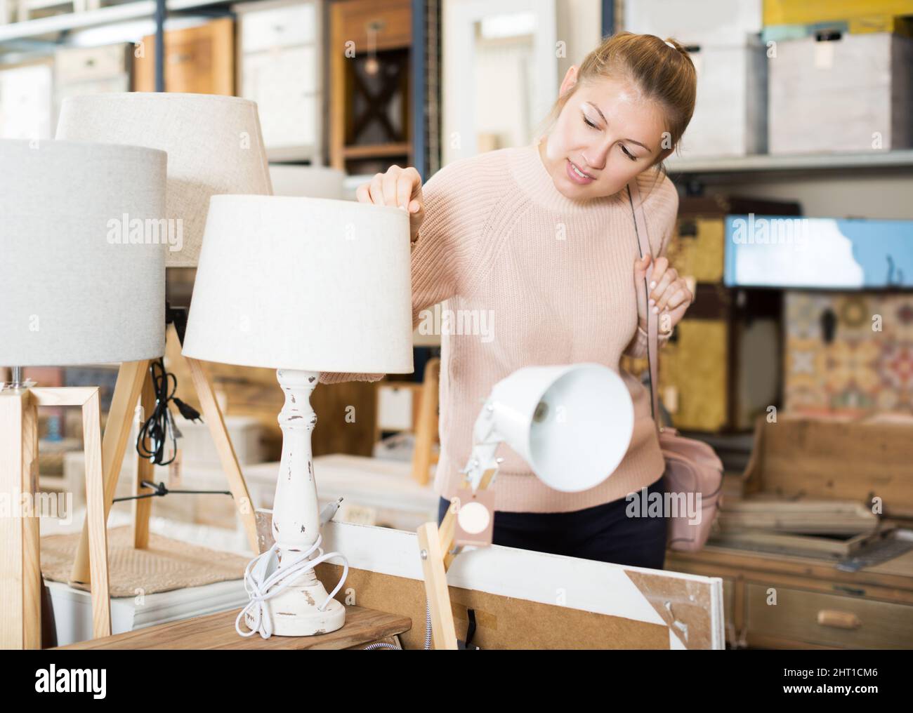 consumer choosing torchere Stock Photo - Alamy