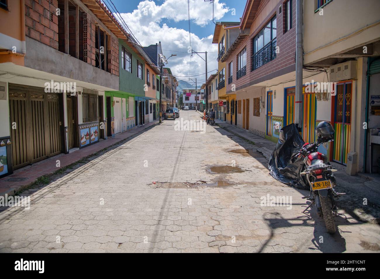 A street in the town of Guatape in Colombia Stock Photo - Alamy