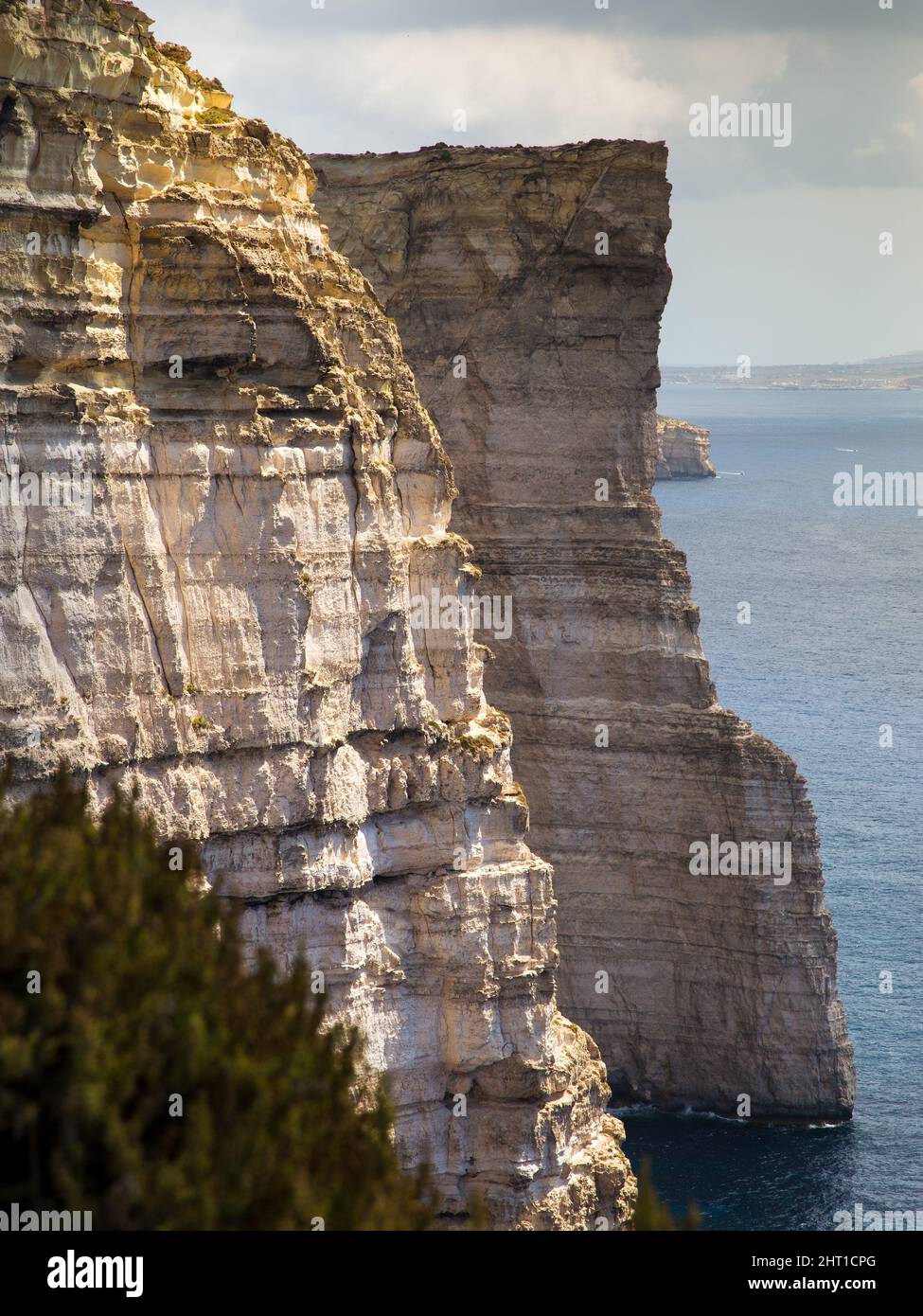Vertical shot of Sanap Cliffs in Gozo Stock Photo - Alamy