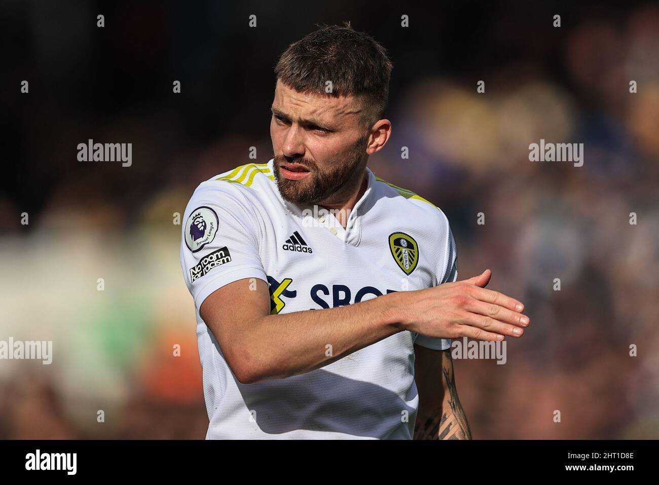 Stuart Dallas #15 of Leeds United talking tactics to Luke Ayling #2 of ...