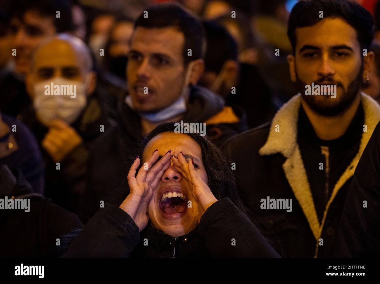 Madrid, Spain. 26th Feb, 2022. A protestor shouts slogans as he takes ...