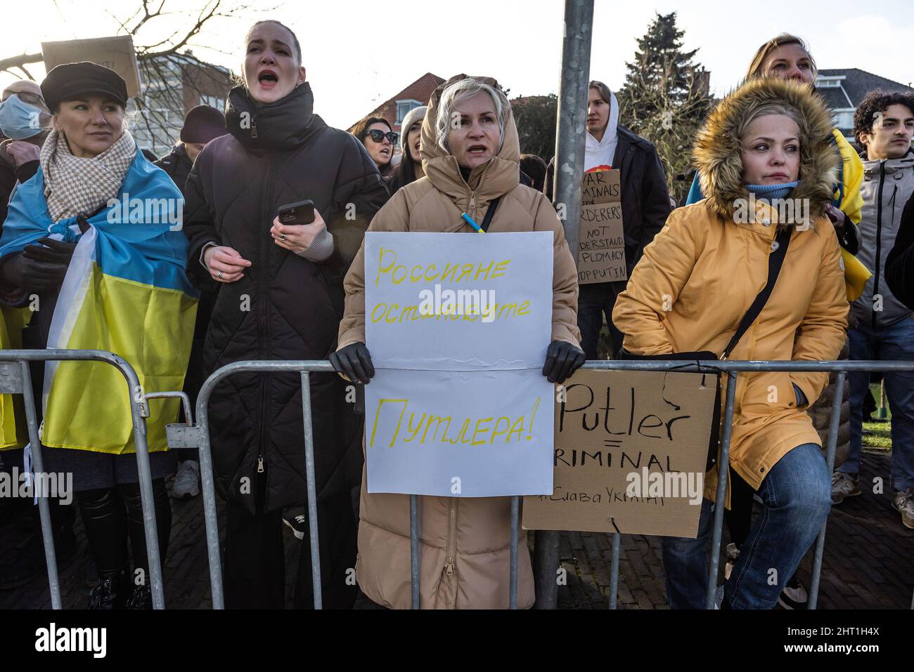 A protester holds a placard expressing her opinion during the ...