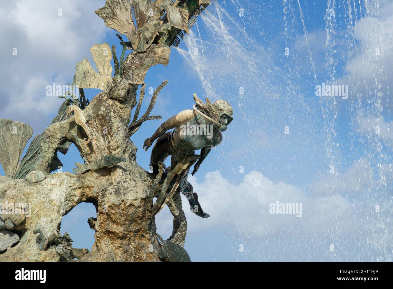 Cozumel, Mexico; Feb. 25. 2022: Fountain statue in bronze diver ...