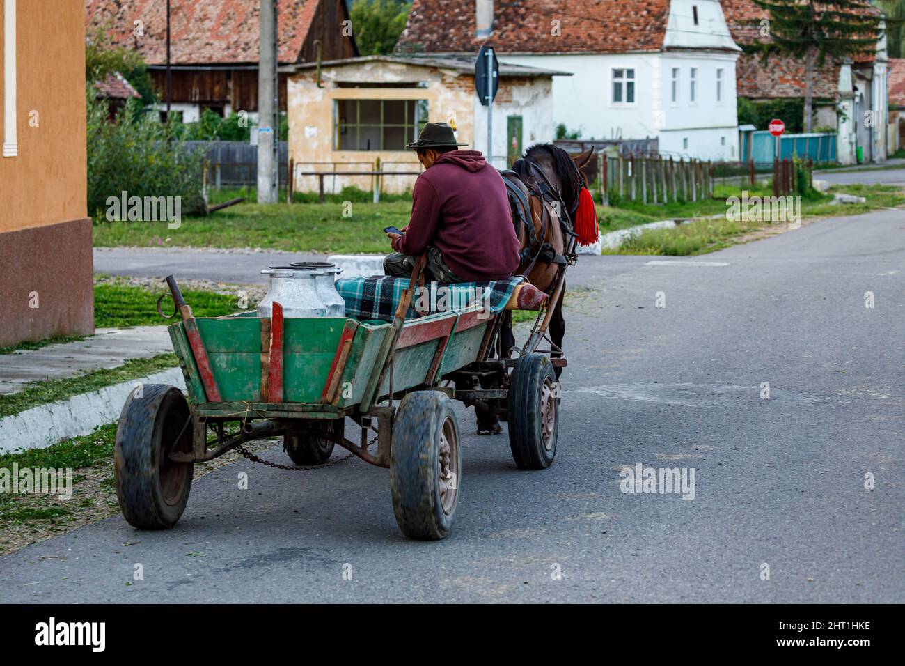 Horse carriage and farmer in Biertan Romania Stock Photo - Alamy
