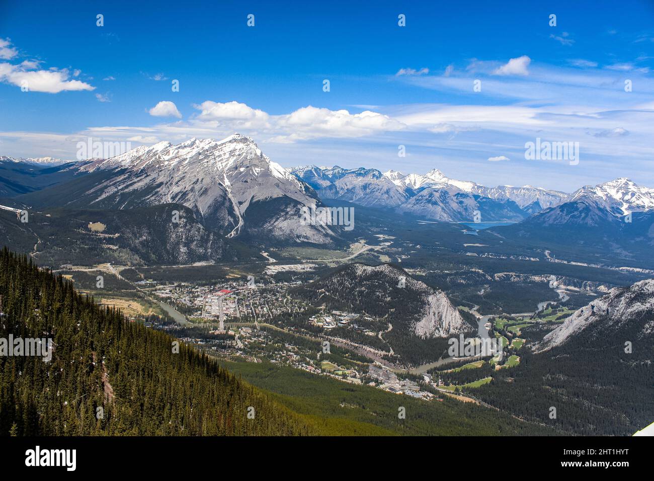 Landscape of mountain ranges covered in the snow under the sunlight in ...