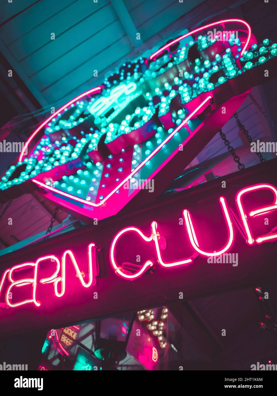 Heart-shaped pink neon sign with blue neon writing - retro style ...