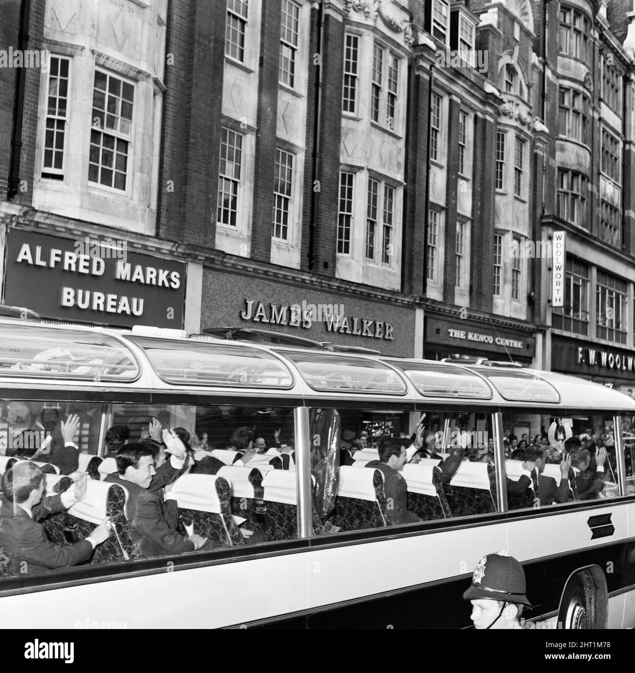 The victorious 1966 England team wave to jubilant fans gathered to ...