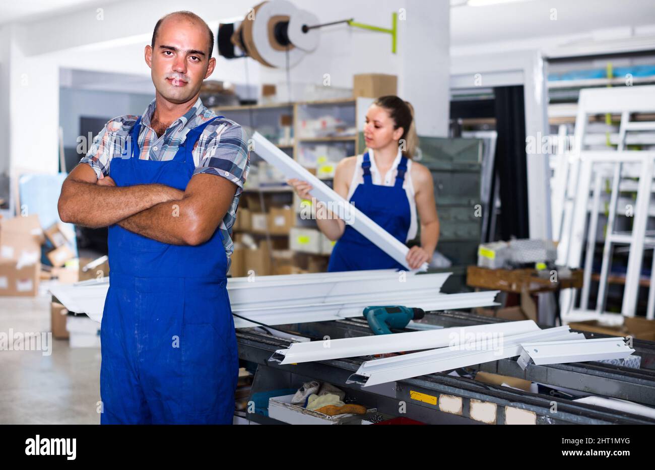 Worker production manager owner hi-res stock photography and images - Alamy