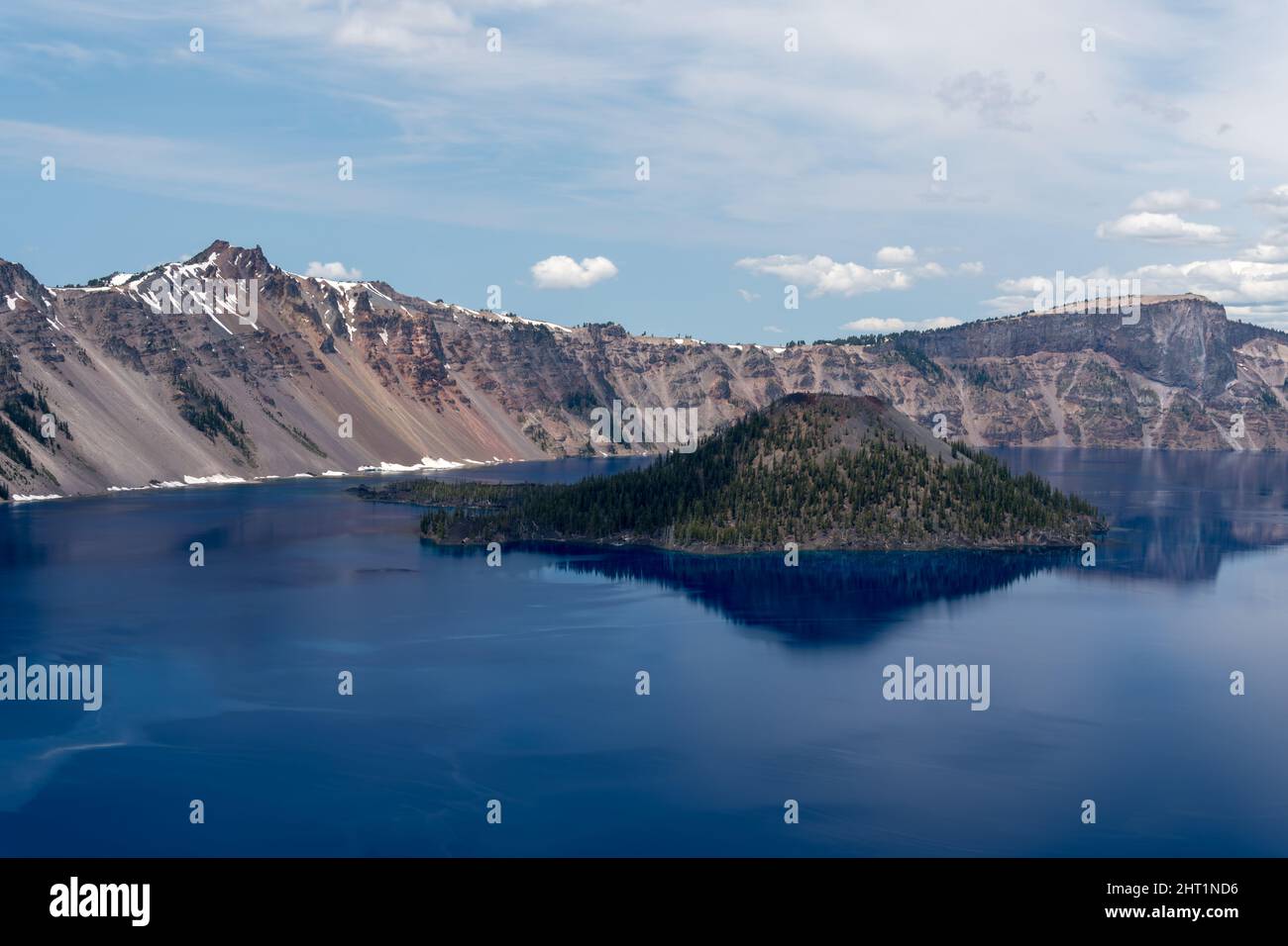 Deep lake and an island in a mountainous area Stock Photo - Alamy