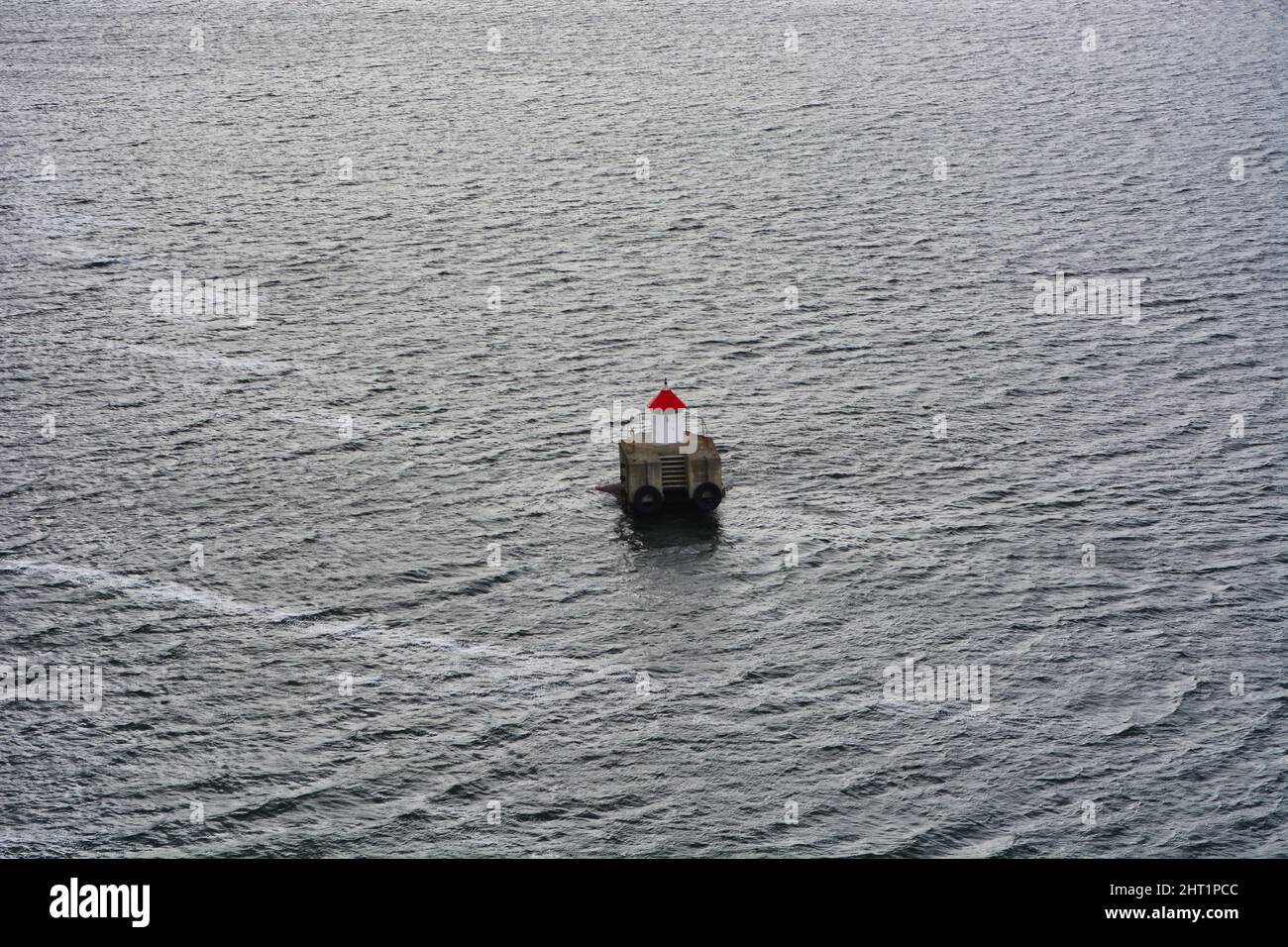 Safe water mark buoy in the middle of the sea Stock Photo - Alamy