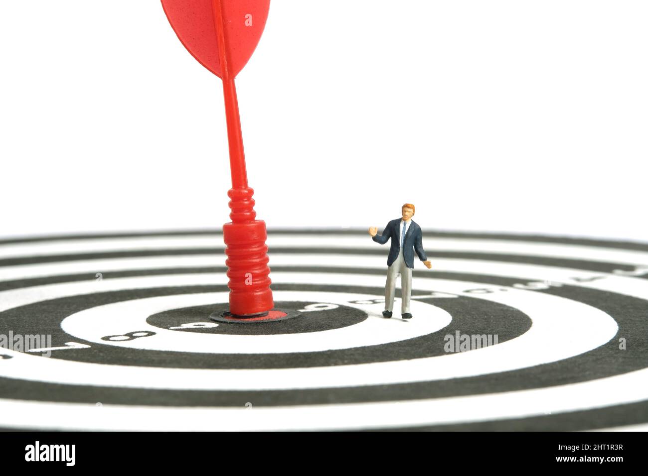 Miniature people toy figure photography. A shrugging businessman ...