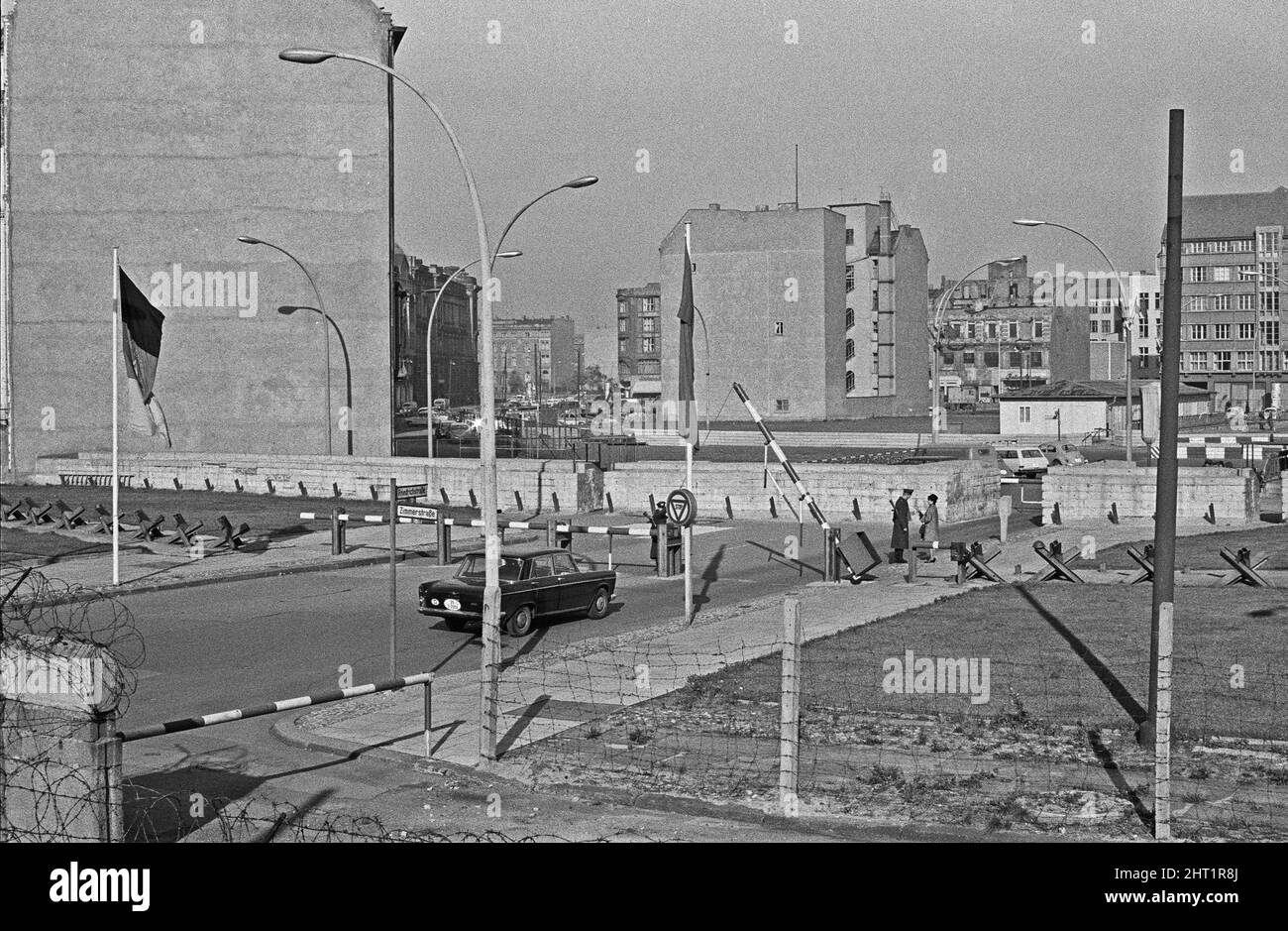 A German diplomatic car crossing the Berlin Wall at Checkpoint Charlie ...