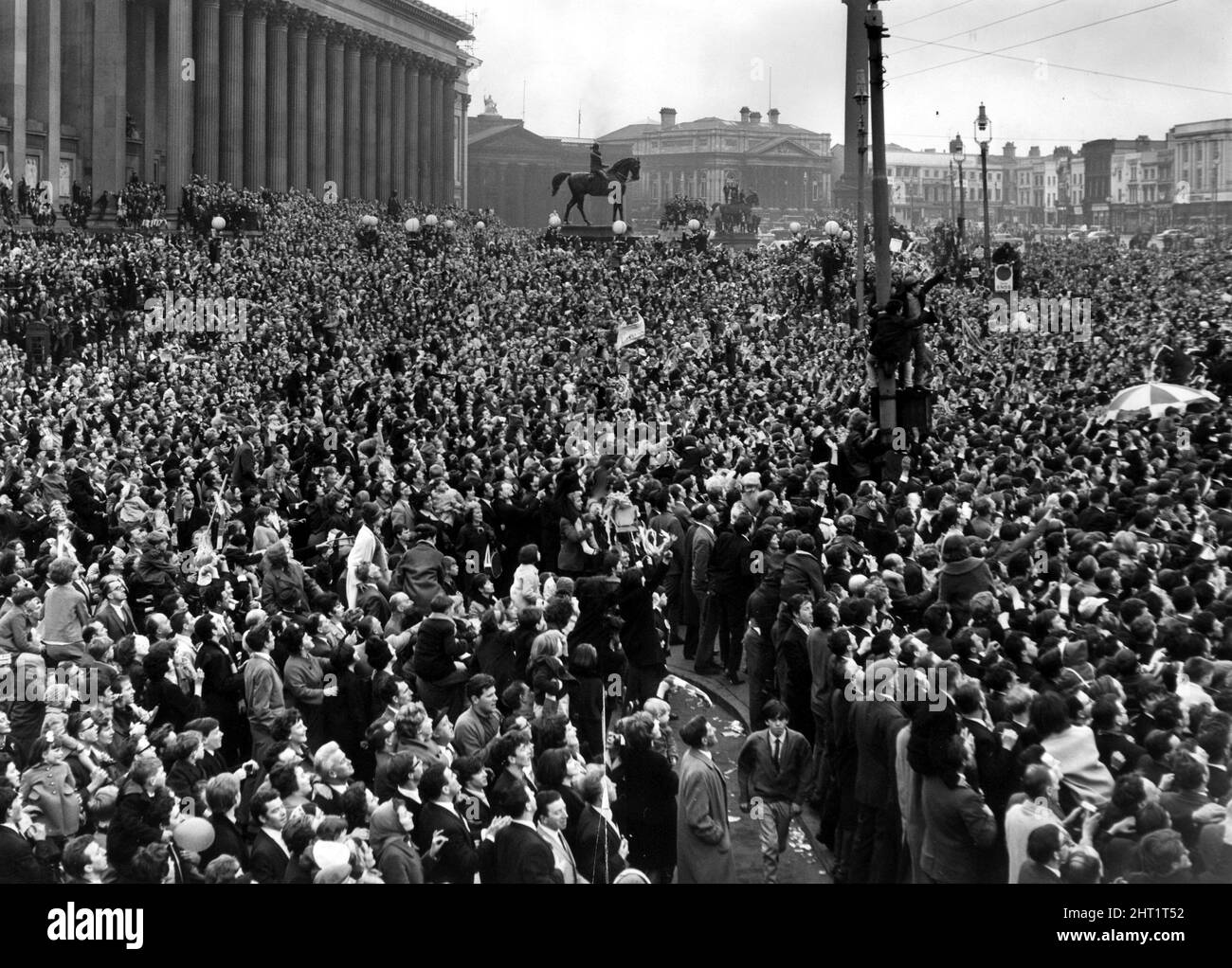 Liverpool FC fans gather in St George's square to welcome home the FA ...