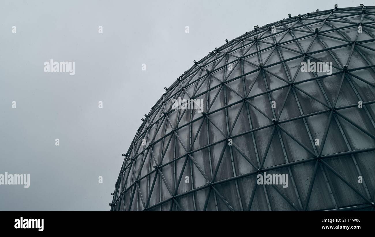Closeup of a round glass building Stock Photo - Alamy
