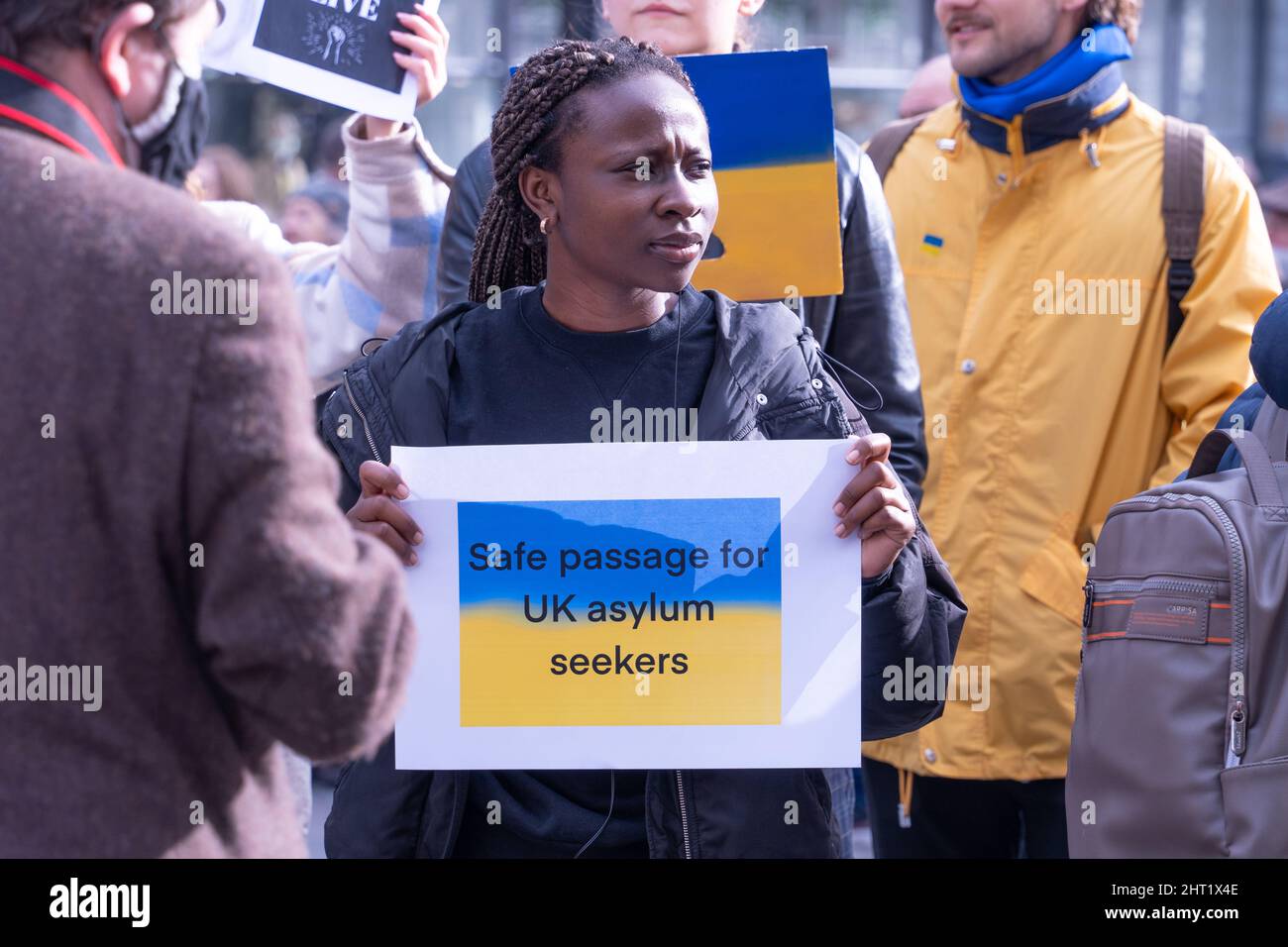 Protesters demonstrating against Russia's invasion of Ukraine, in ...
