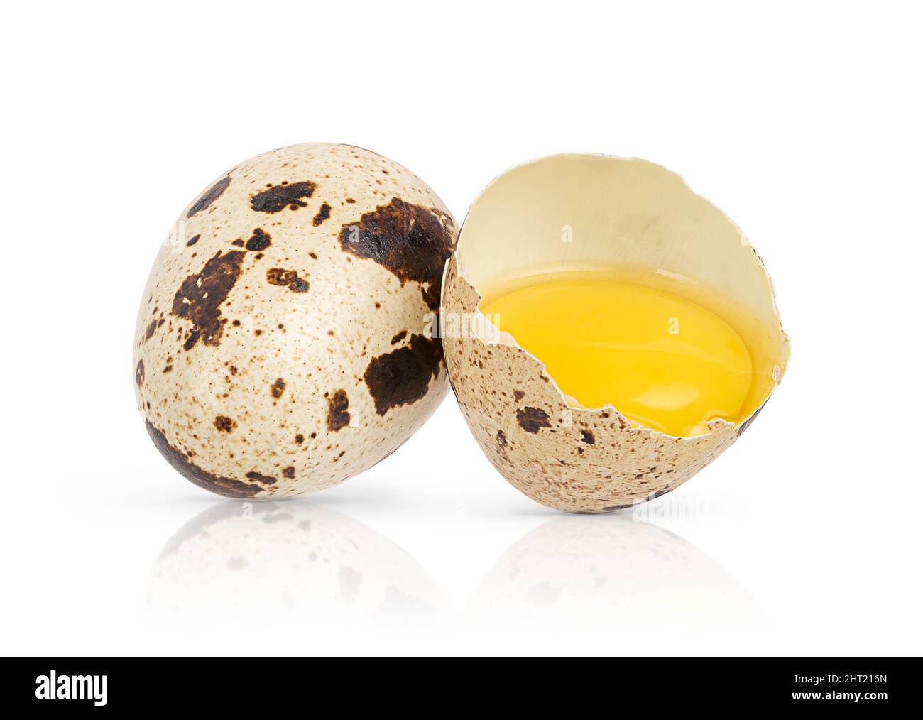 Quail egg with broken one isolated on white background. Close up Stock ...