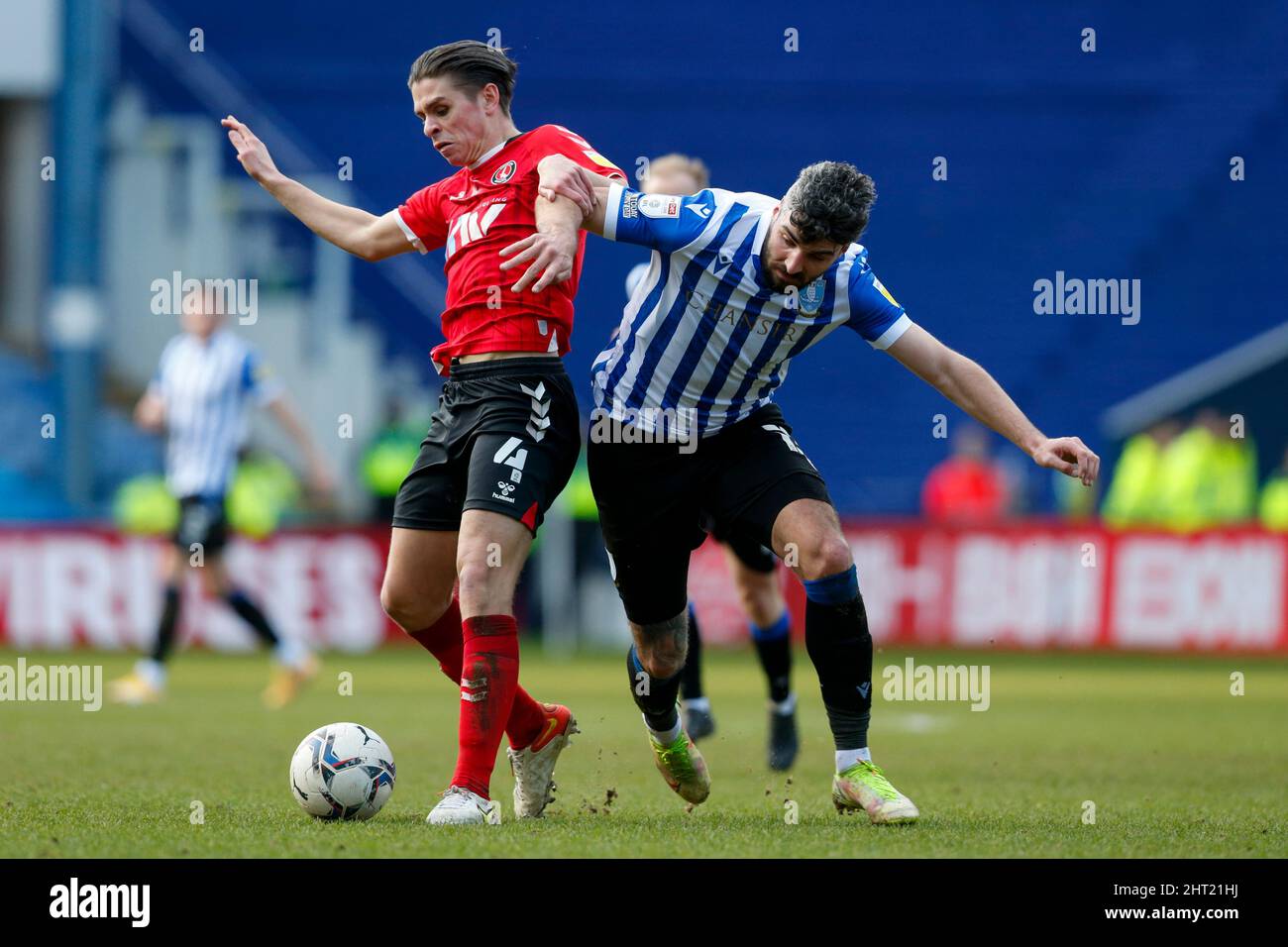George Dobson #4 of Charlton Athletic and Callum Paterson #13 of ...
