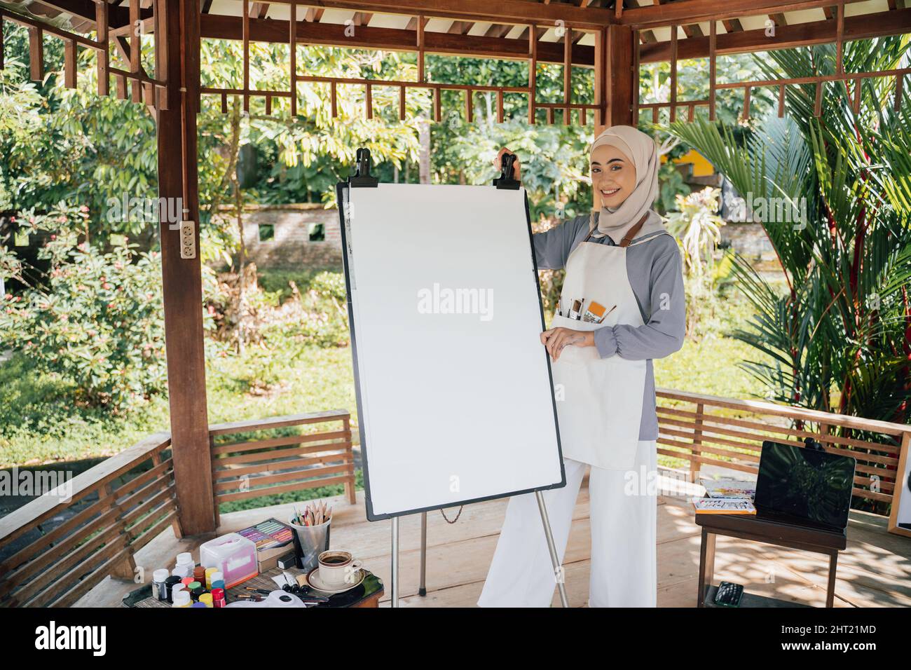 Beautiful female painter showing hi-res stock photography and images ...