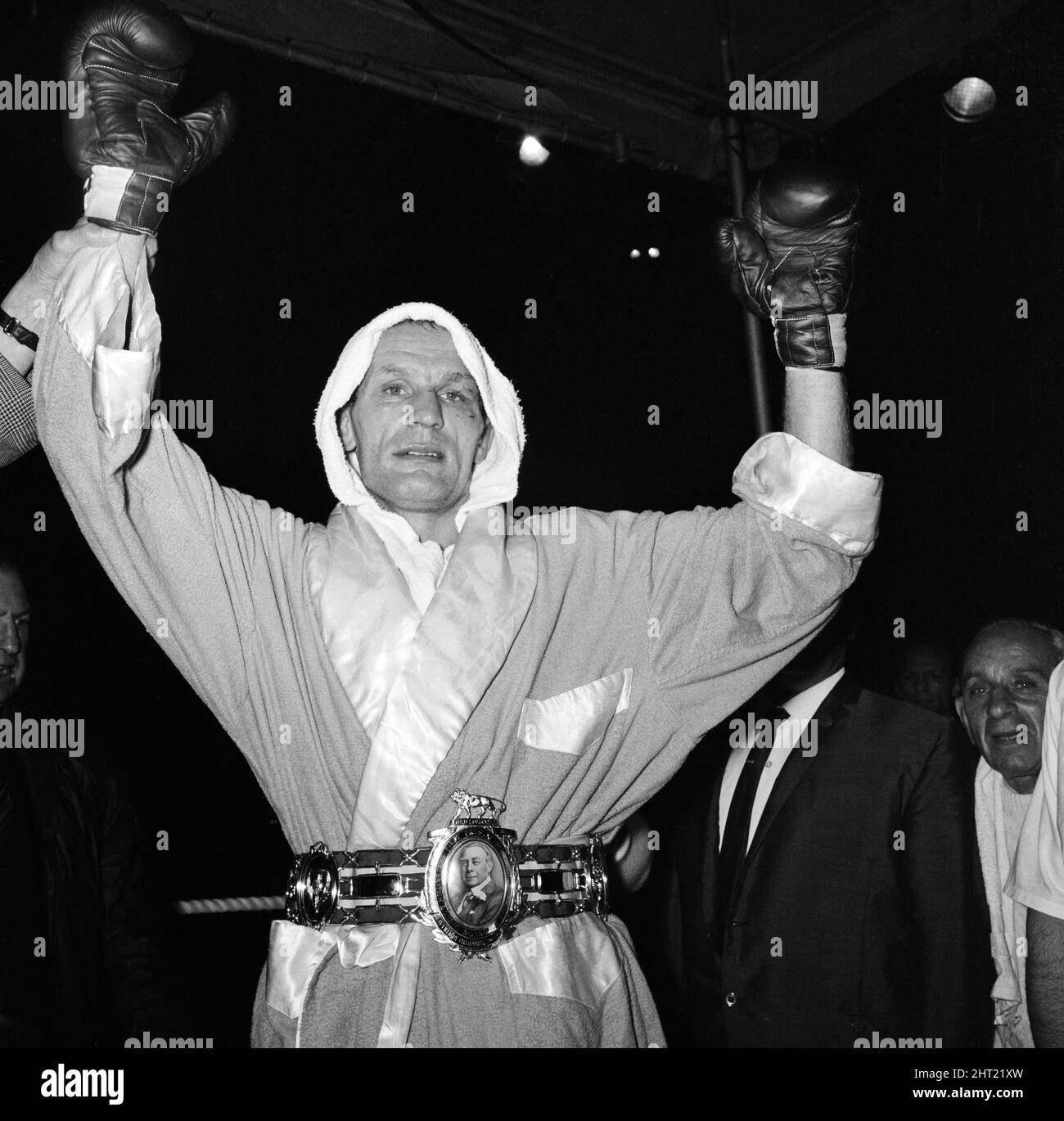 Henry Cooper jubilantly shows his Lonsdale belt after his boxing ...