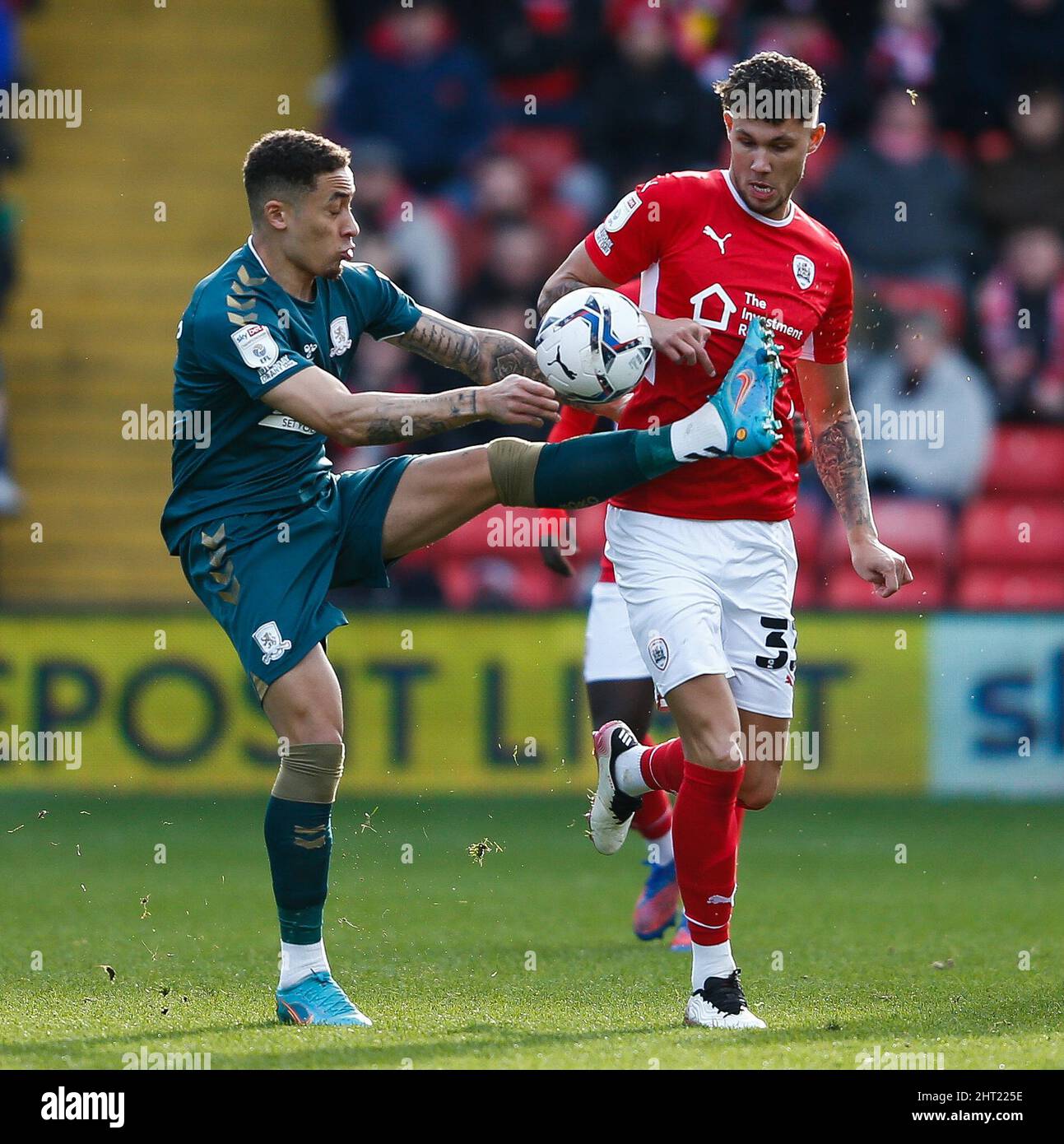 Middlesbrough's Marcus Tavernier and Matty Wolfe of Barnsley during the ...