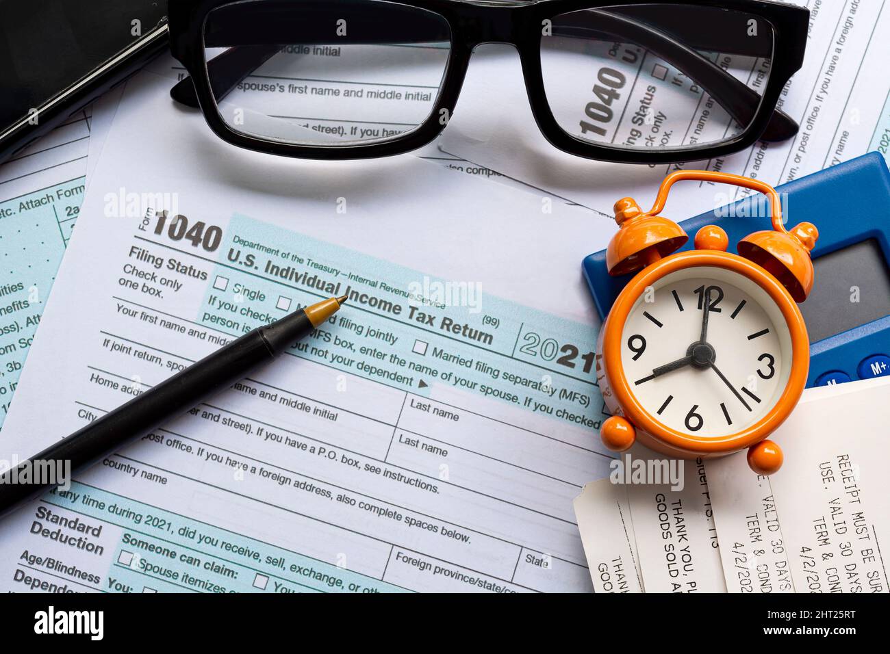 Tax forms 1040. U.S Individual Income Tax Return on a desk. Business ...