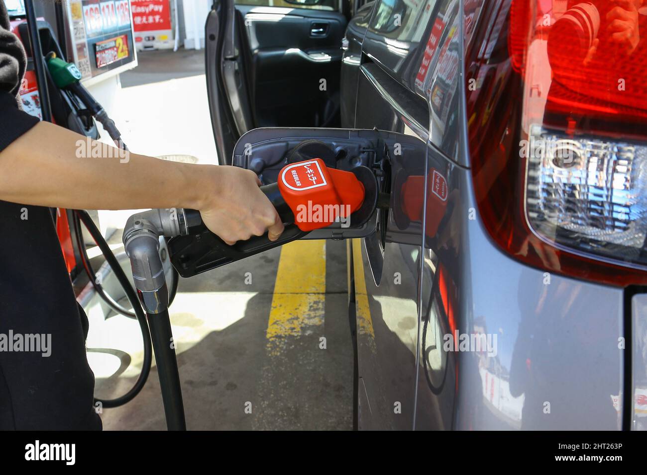 Soaring crude oil prices. Gasoline price hike. Japan's prime minister ...