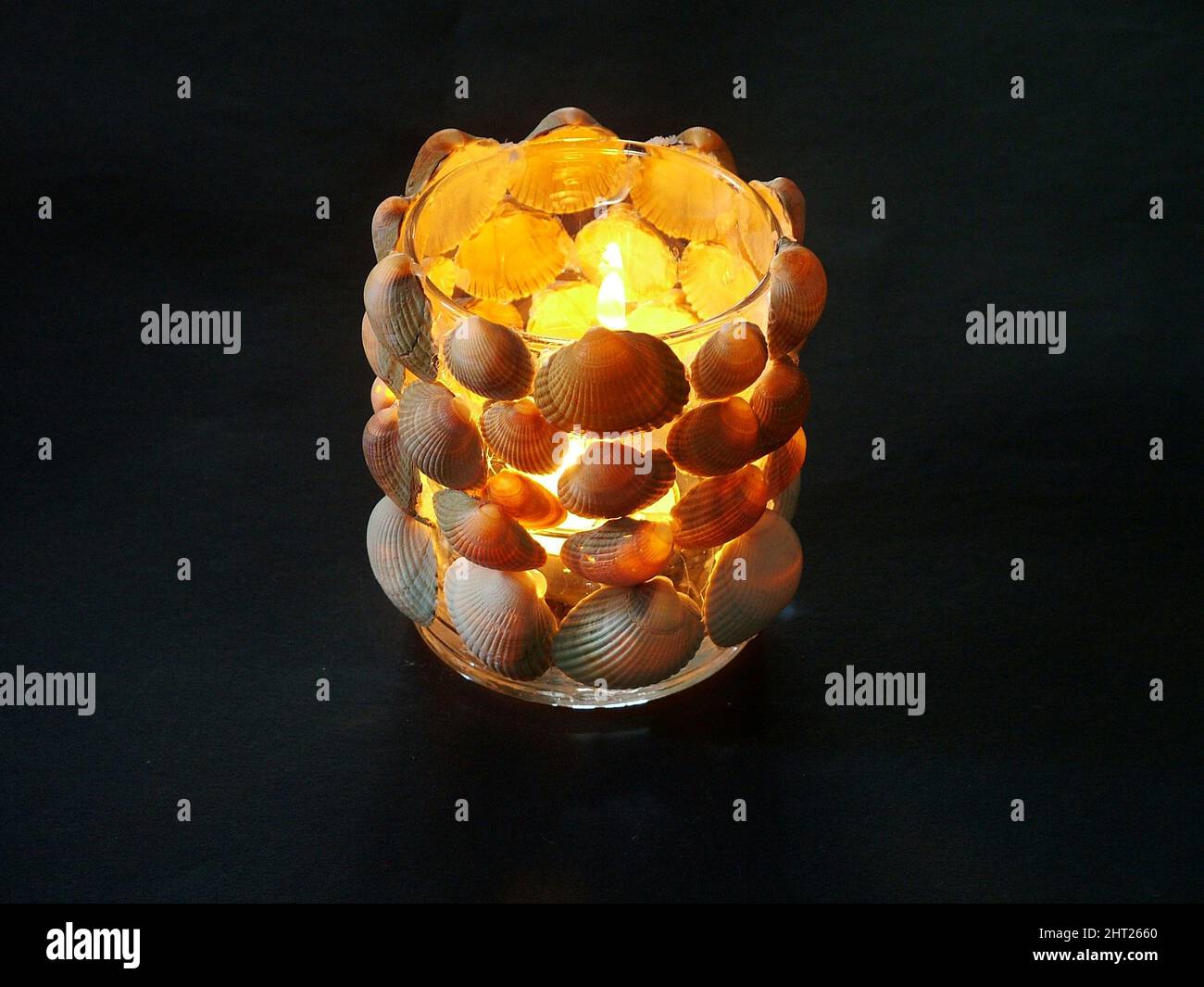 Candle lantern made of mussel shell and glass Stock Photo - Alamy