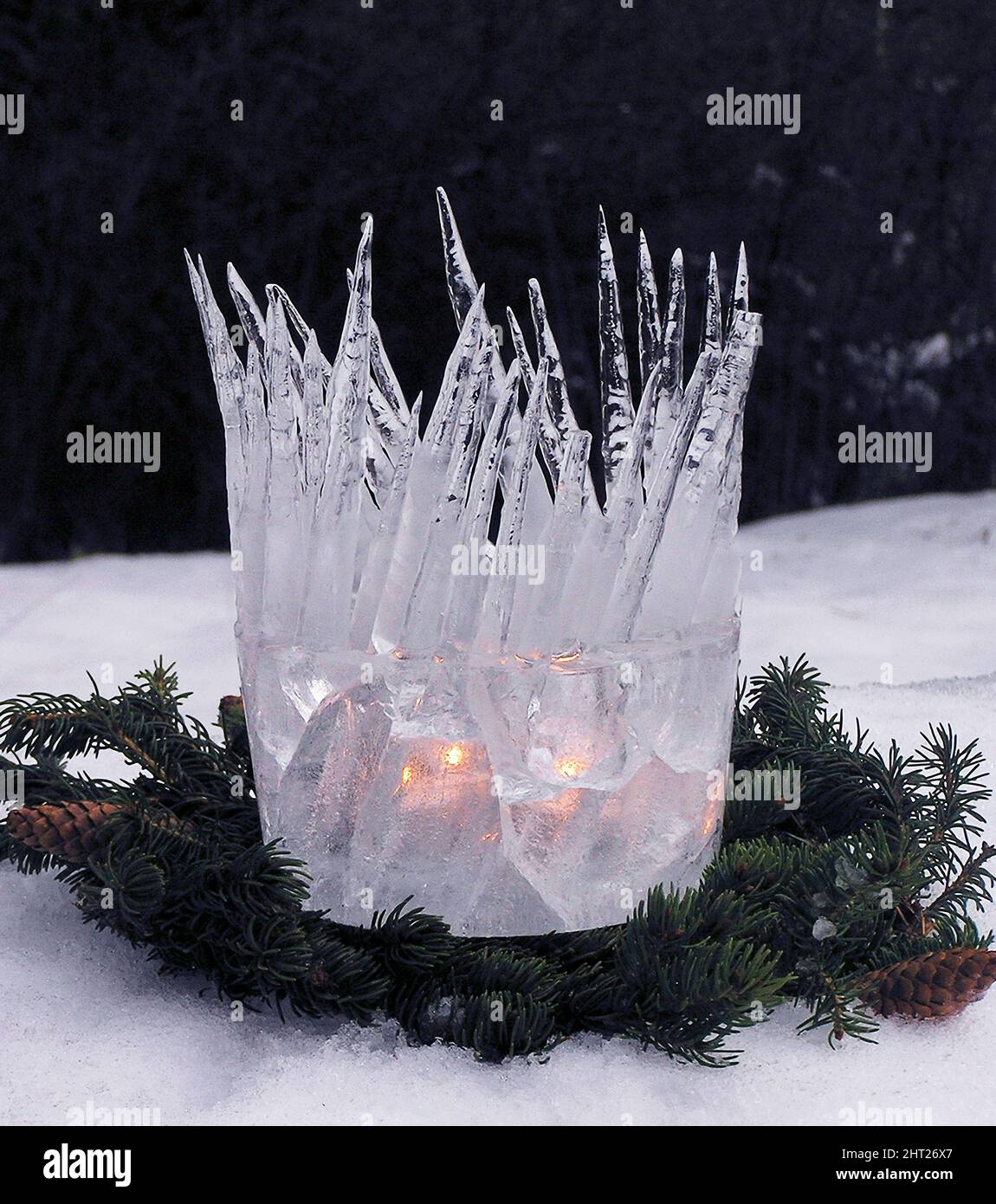 Ice lantern with icicles Stock Photo - Alamy