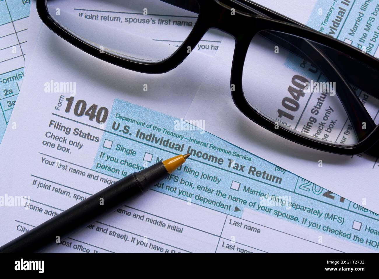 Tax forms 1040. U.S Individual Income Tax Return on a desk. Business ...