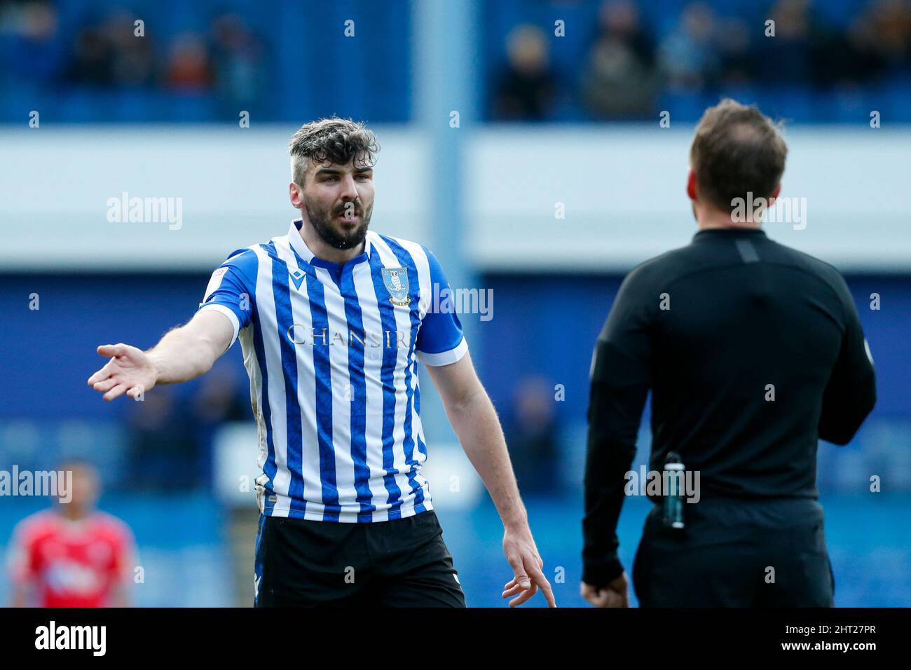 Callum Paterson #13 of Sheffield Wednesday protests to the referee ...