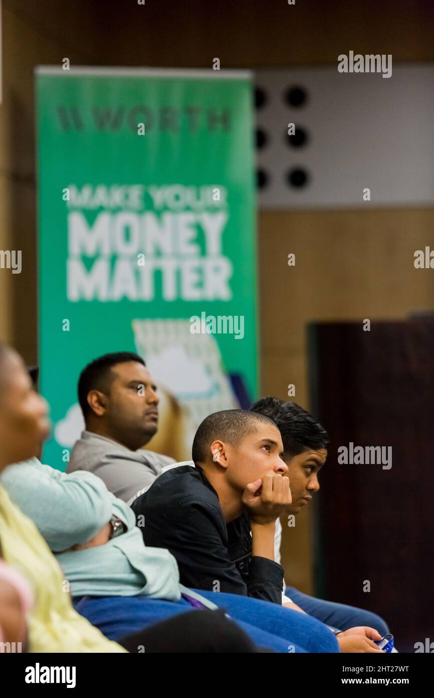 Diverse adult students attending a class on finance Stock Photo - Alamy