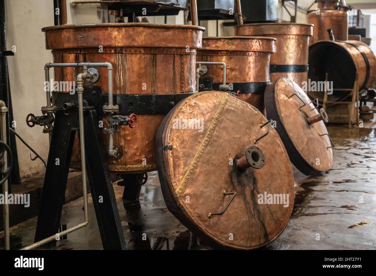 Closeup of copper containers in a daylight Stock Photo - Alamy