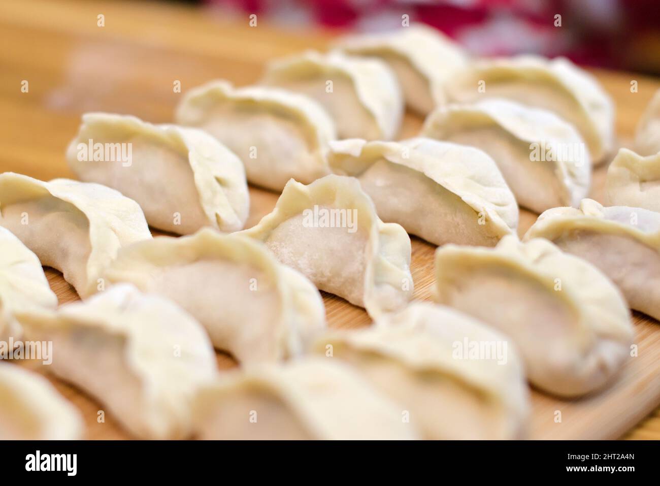 Closeup of dumplings in a row Stock Photo - Alamy