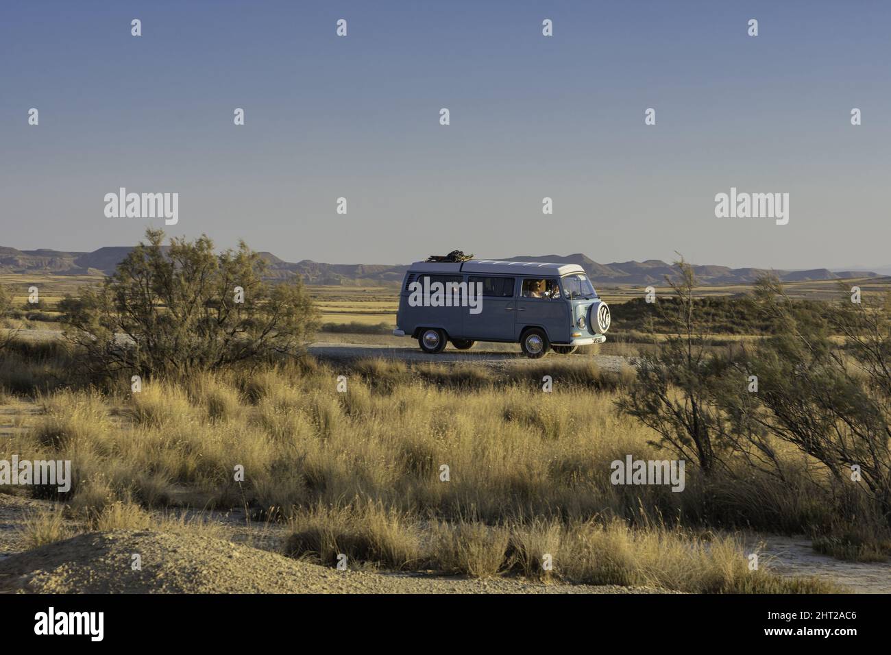 Old and typical camper van in the desert Stock Photo - Alamy