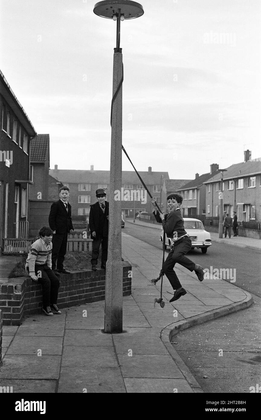Children playing in Kirkby, Liverpool. 18th March 1965 Stock Photo - Alamy